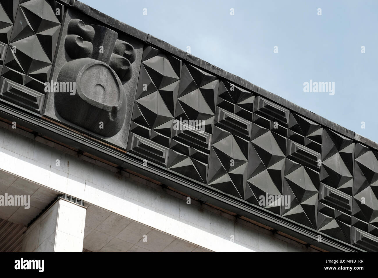 Detail of sculpted relief at the facade of the National Opera and ...