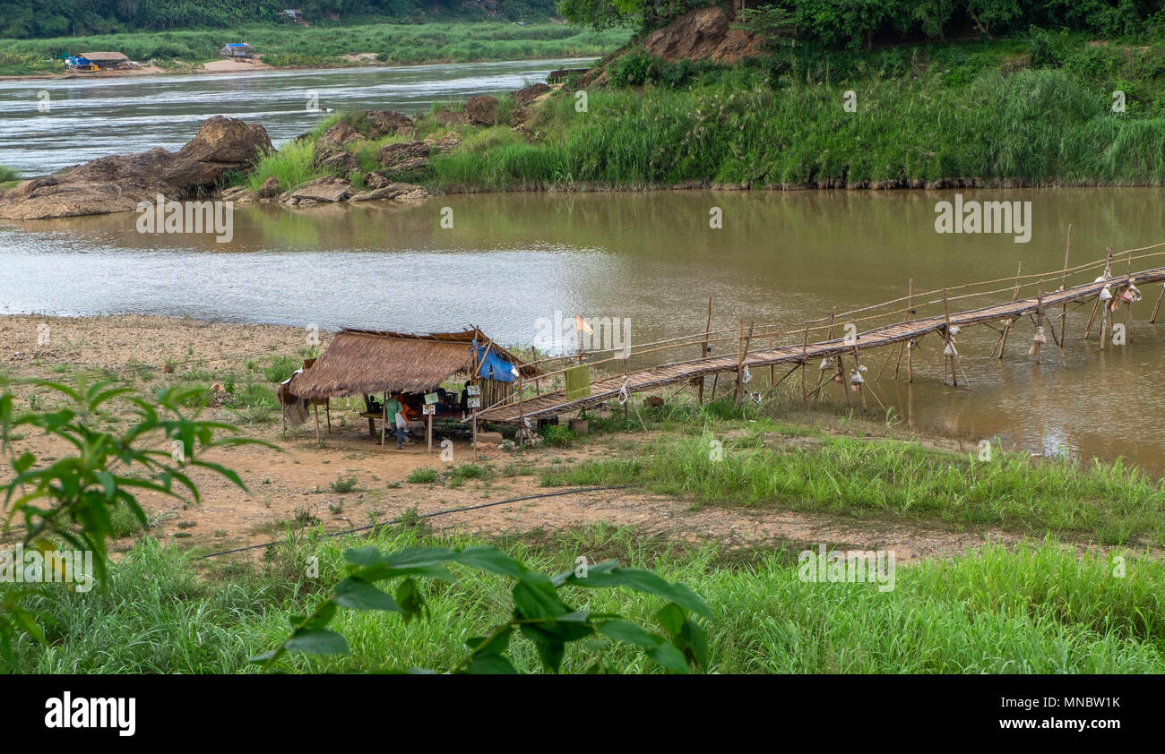 Bamboo Bridge Over The Nam Kahn River Near Its Confluence With The