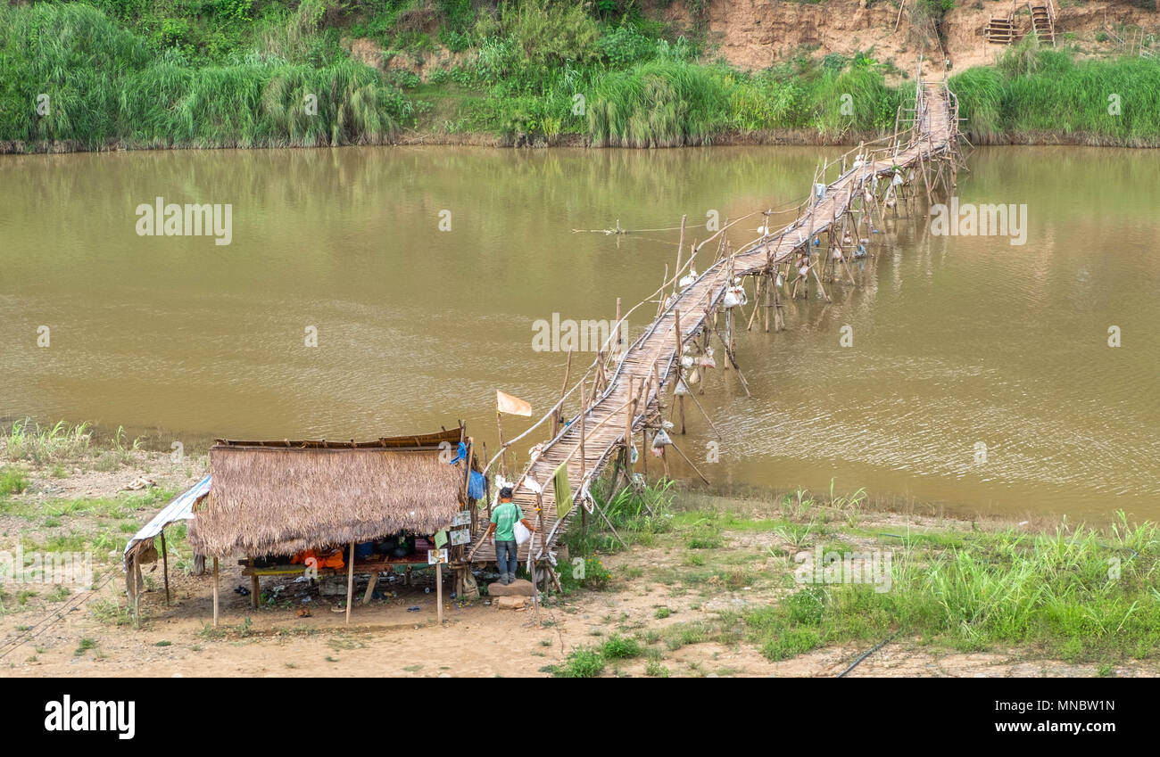 Bamboo Bridge Over The Nam Kahn River Near Its Confluence With The