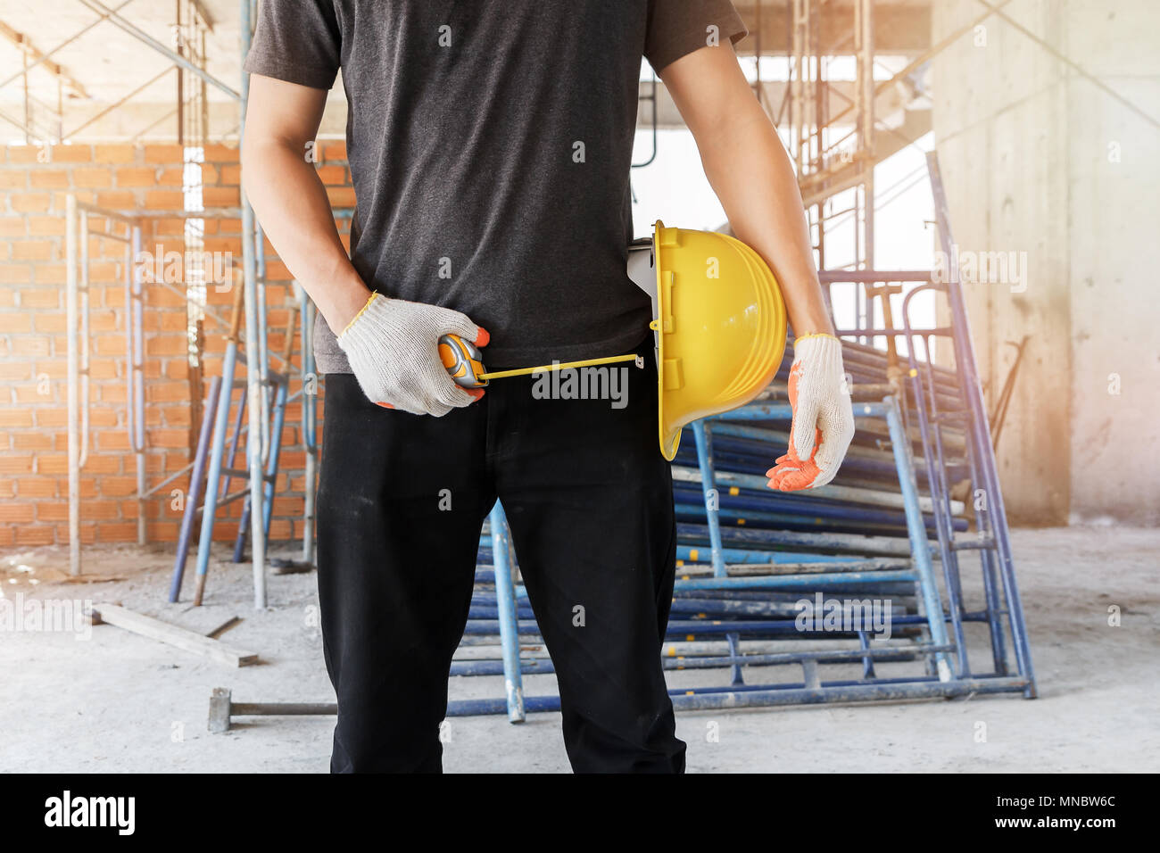Construction Worker with helmet in building construction site Stock ...