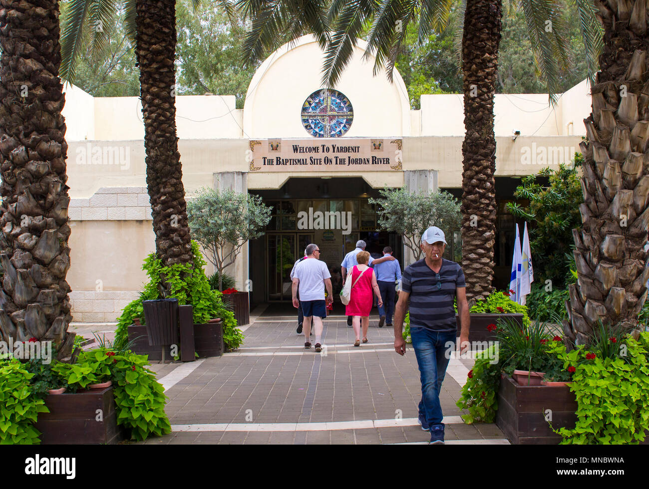 Visitors enter the famous Yardenit Baptismal Centre on the River Jordan ...