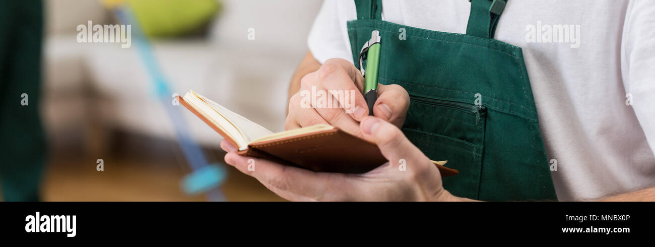 Professional cleaner is distributing duties among his workers Stock ...