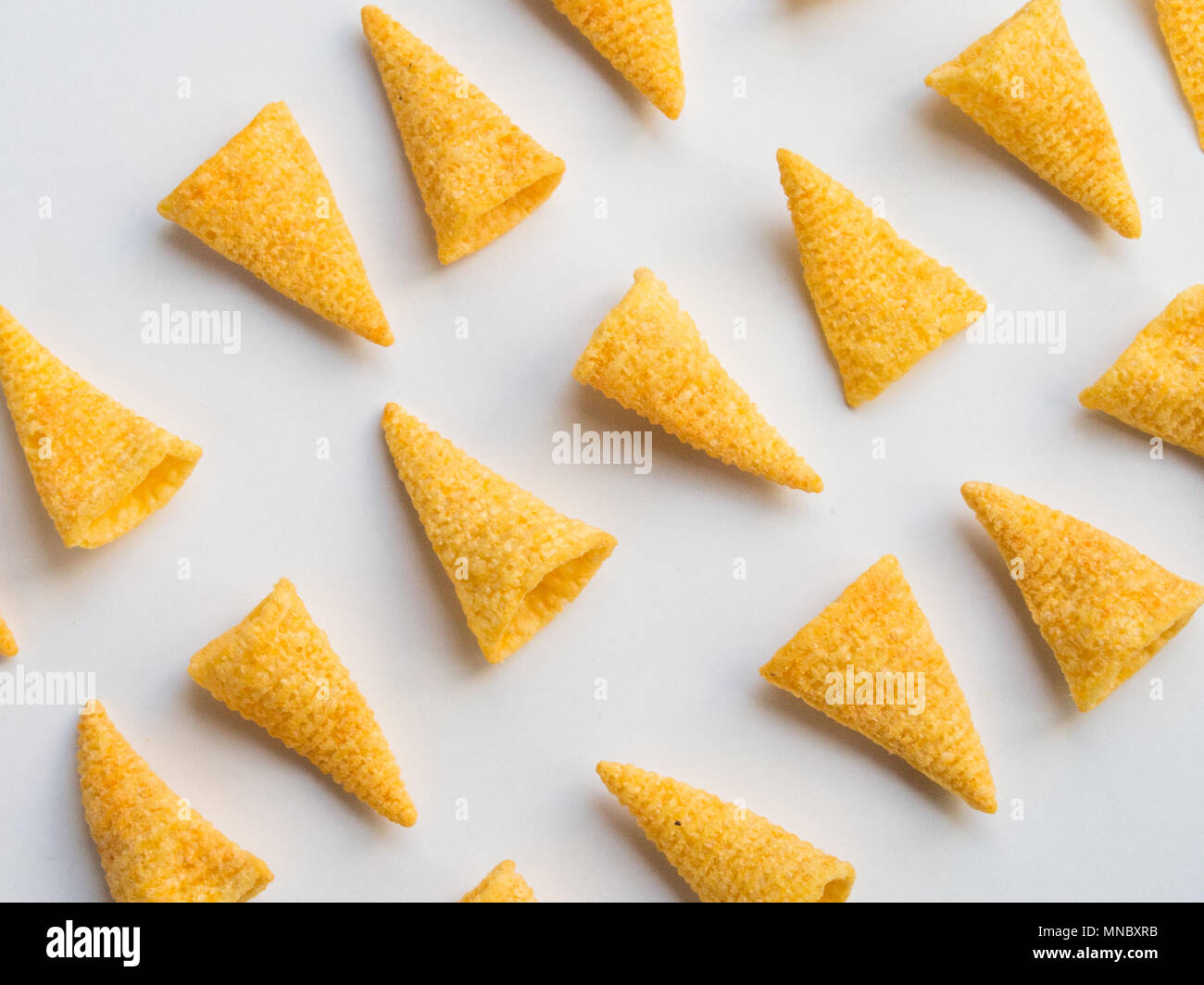 Corn cones pattern on white background Stock Photo - Alamy
