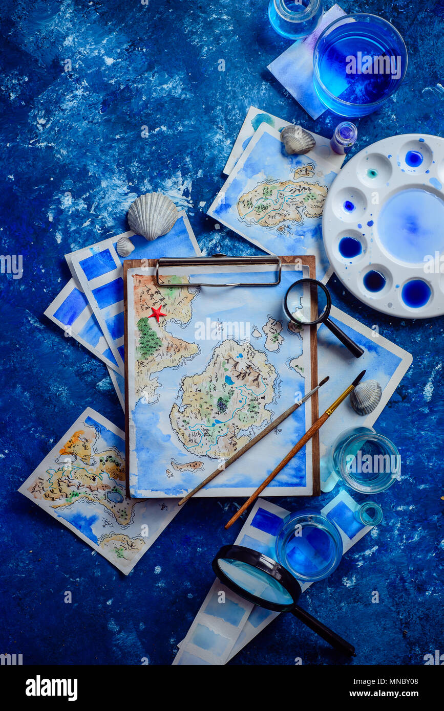 Handpainted fantasy map on a navy blue background with copy space ...