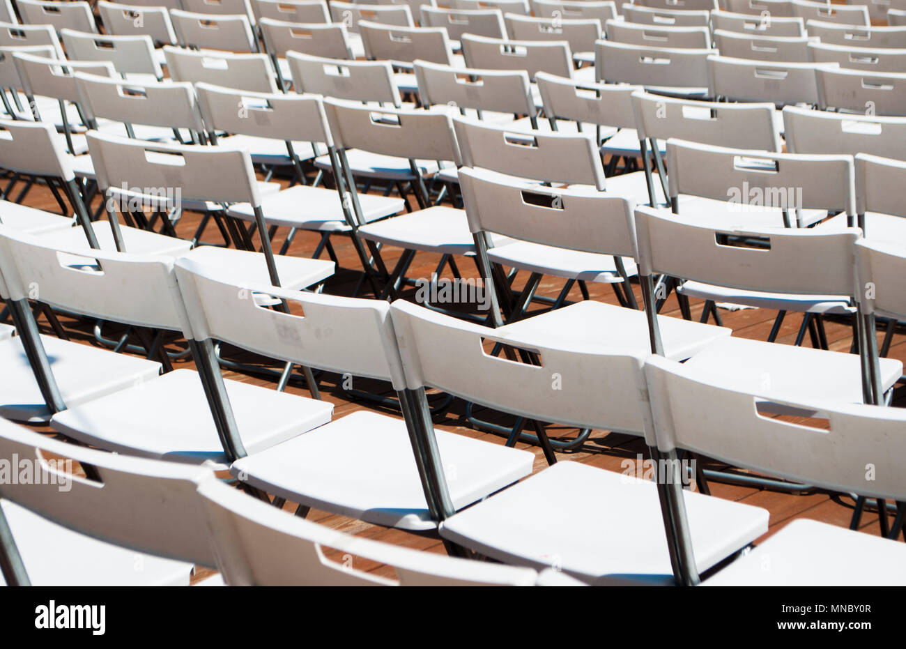 Plastic wedding chairs hi-res stock photography and images - Alamy
