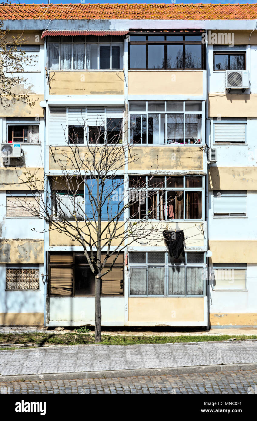 Run down apartment block in Lisbon's suburbs Stock Photo - Alamy