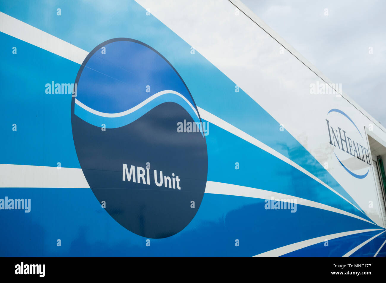 The InHealth logo and branding on a Mobile MRI Scanner outside Queen ...