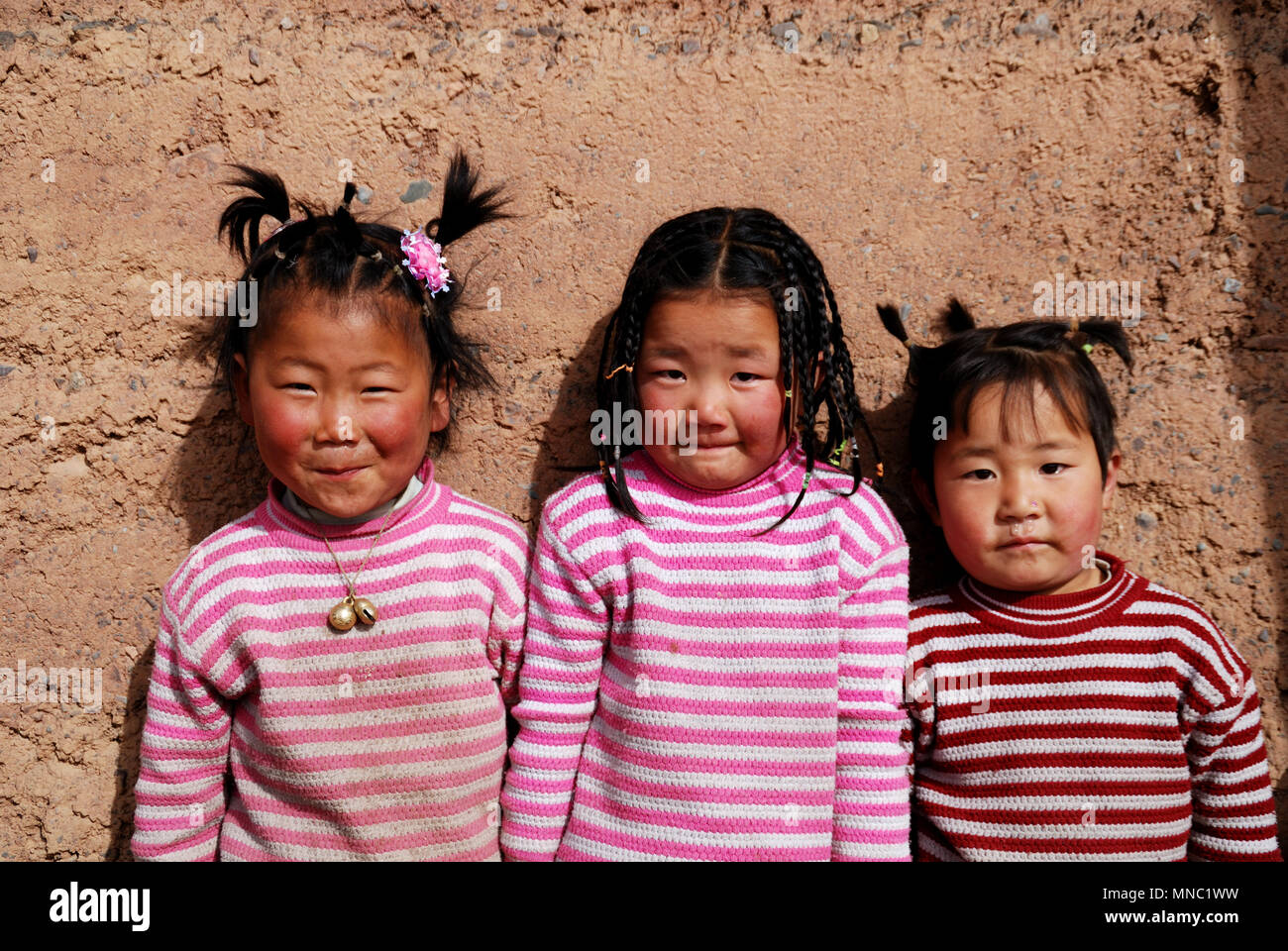 Tibetan little girl in Thangka festival Stock Photo - Alamy