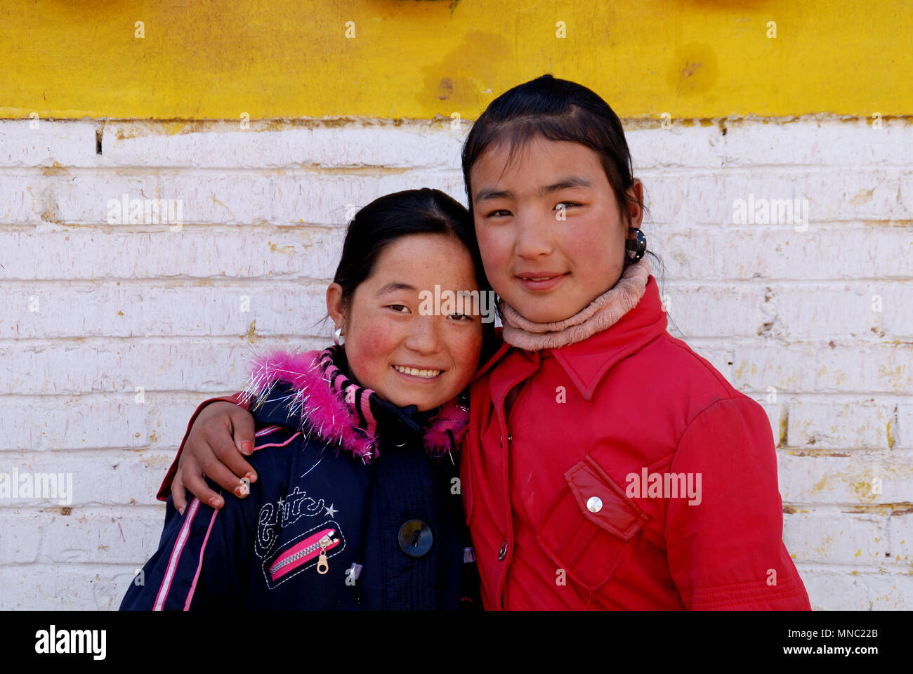 Tibetan girls in traditional costume hi-res stock photography and ...