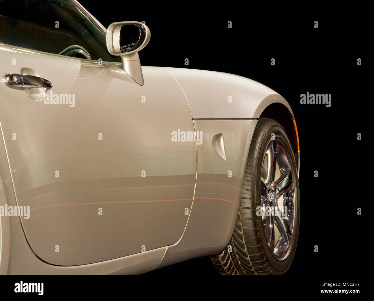 Lookiing down the side of a elegant sports car Stock Photo - Alamy