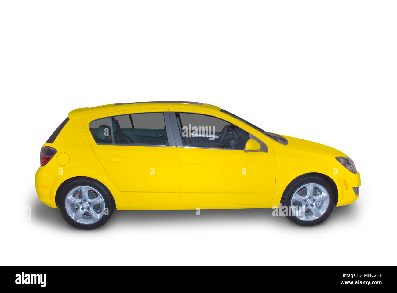 Bright yellow four door compact hybrid car isolated on a white ...