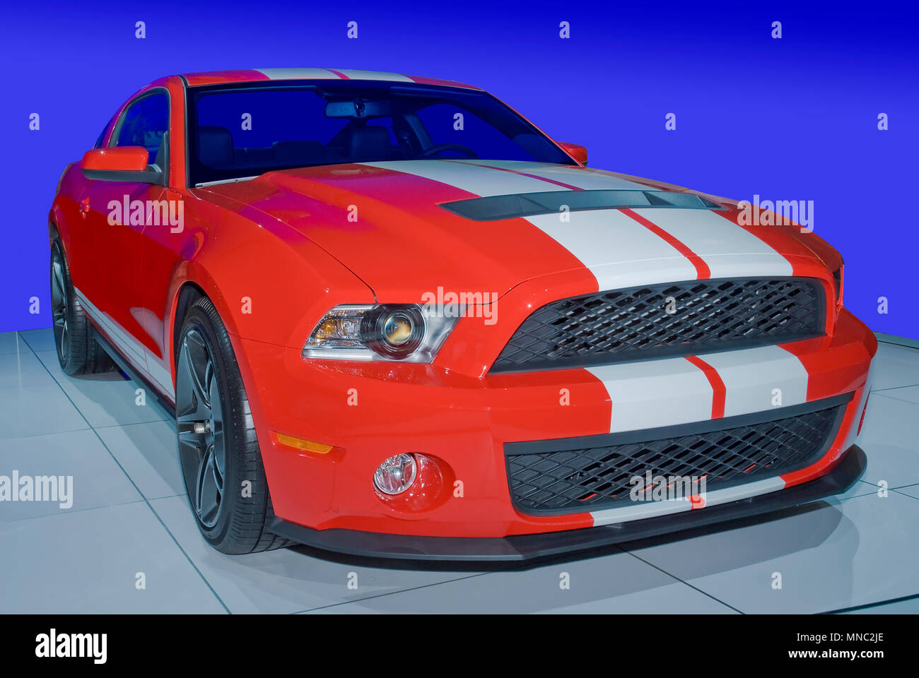 Brand new red sports car. A throwback to the muscle car era of American ...