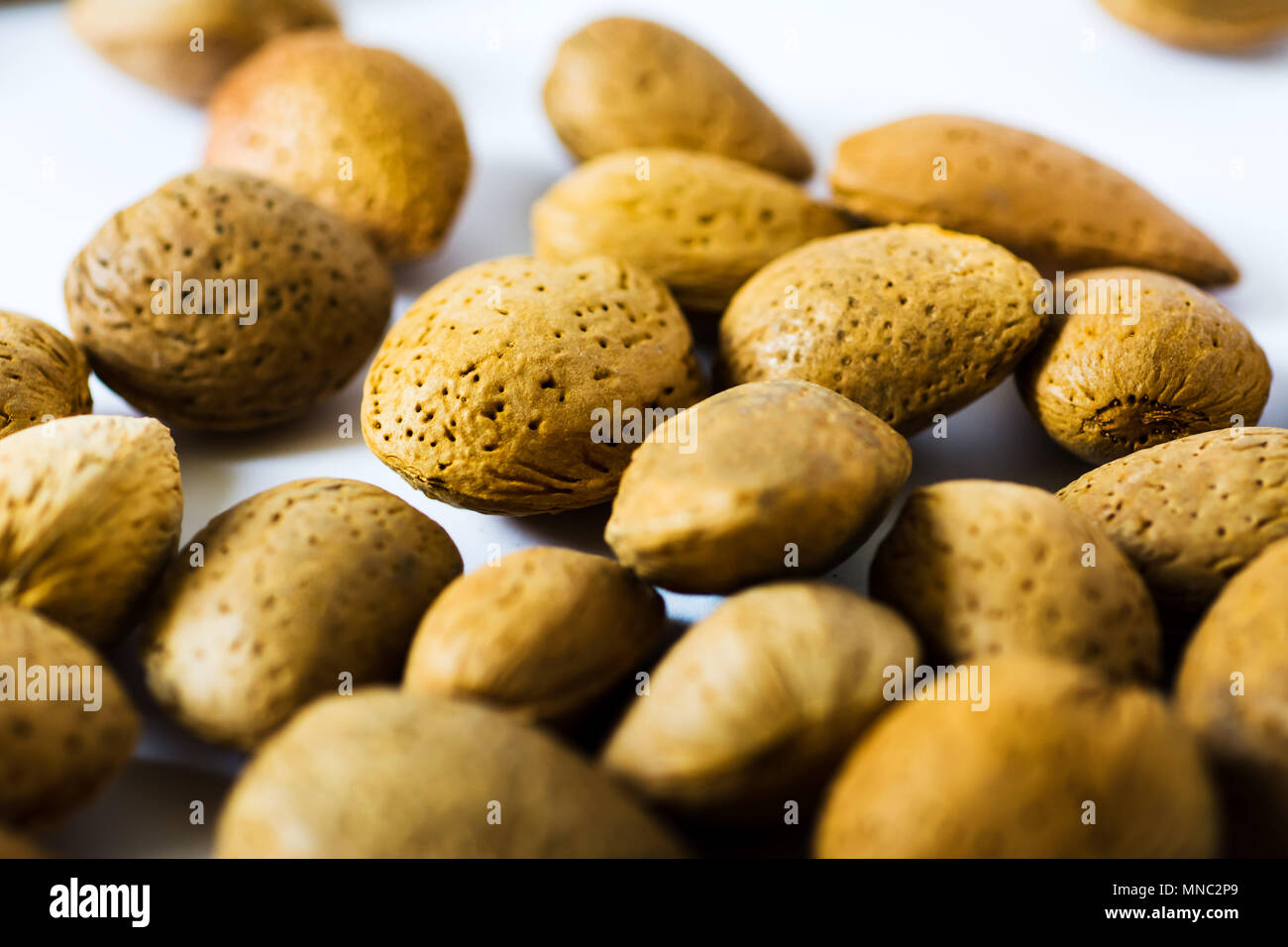 Fresh almonds in shell close up shot Stock Photo - Alamy
