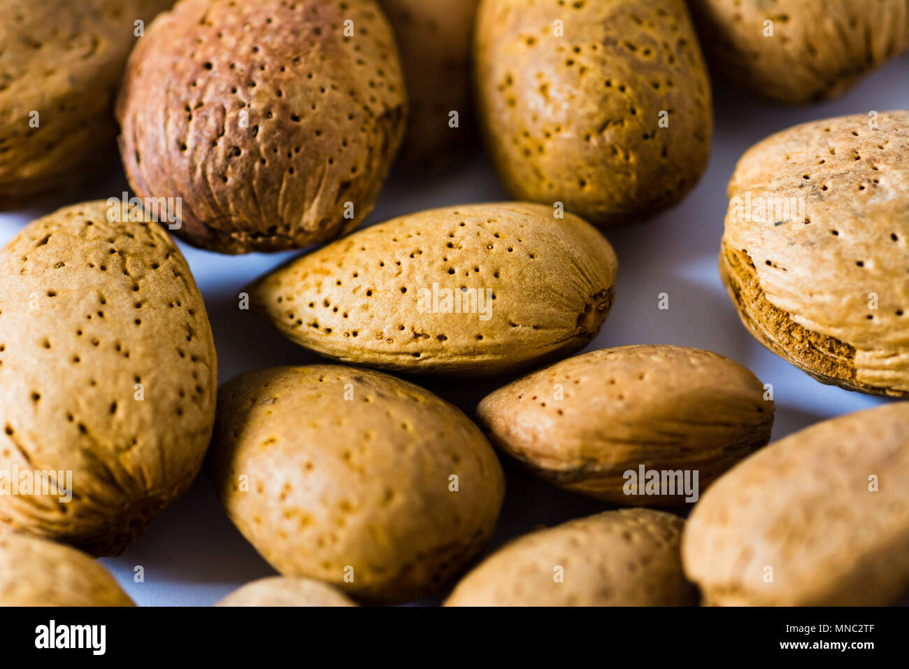 Almonds with shell hi-res stock photography and images - Alamy