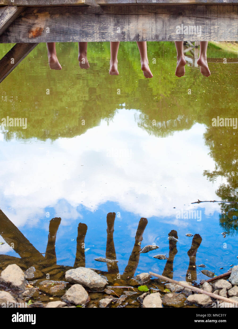 Legs dangling water hi-res stock photography and images - Alamy