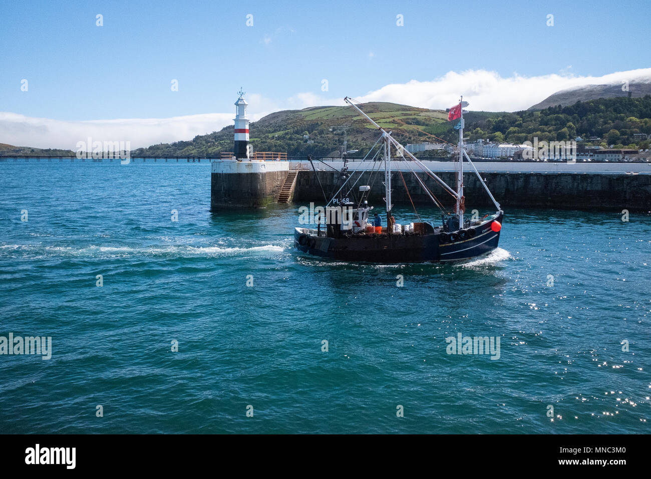 Ramsey, Isle of Man Fishing boat returns to harbour Stock Photo - Alamy