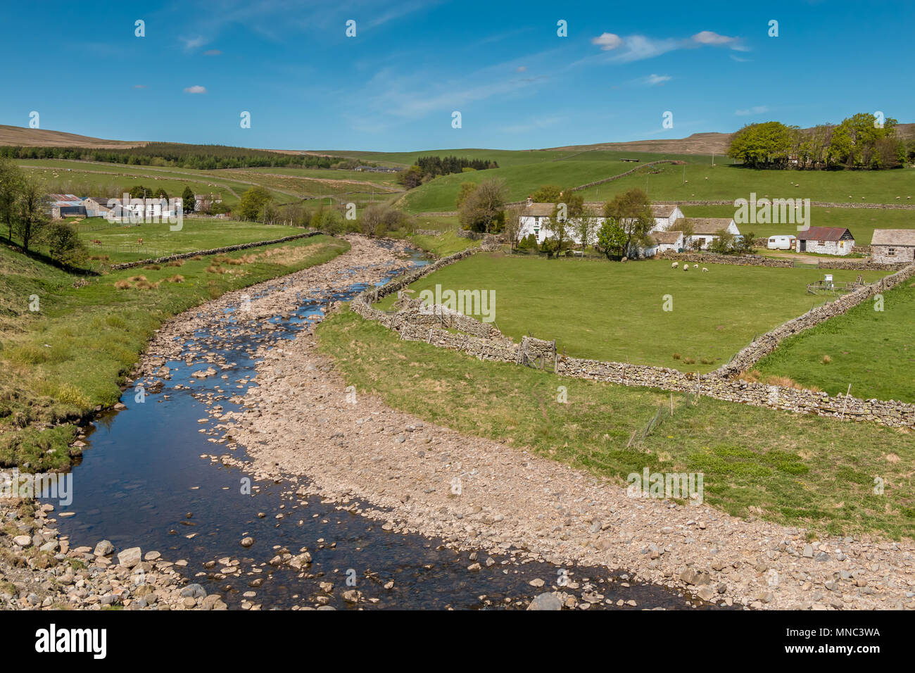 North Pennines landscape, whitewashed farms and Harwood Beck near ...