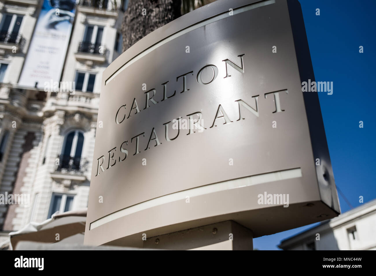 CANNES,FRANCE-MAY 12: carlton hotel restaurant sign in the croisette of ...