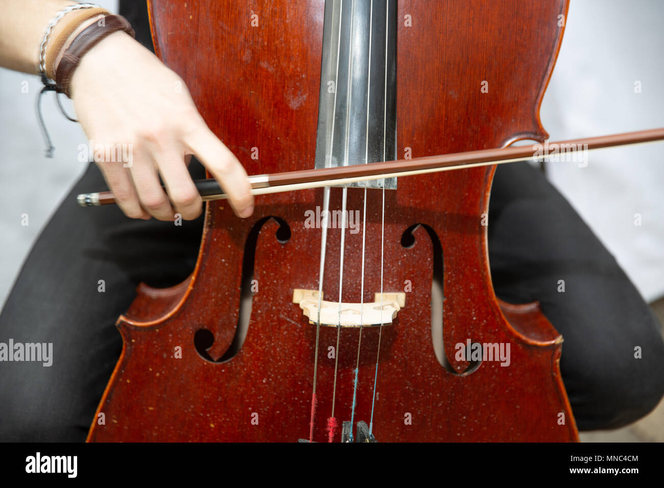 Street Busker Performing Jazz Music Outdoors. Close Up Of Musical ...