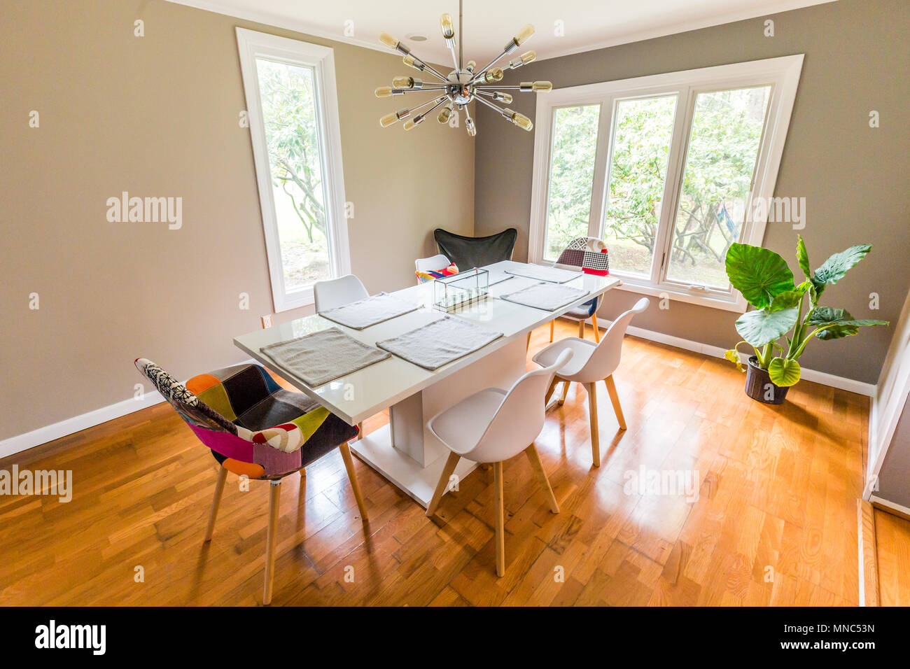 Modern design dining room at daylight interior Stock Photo - Alamy