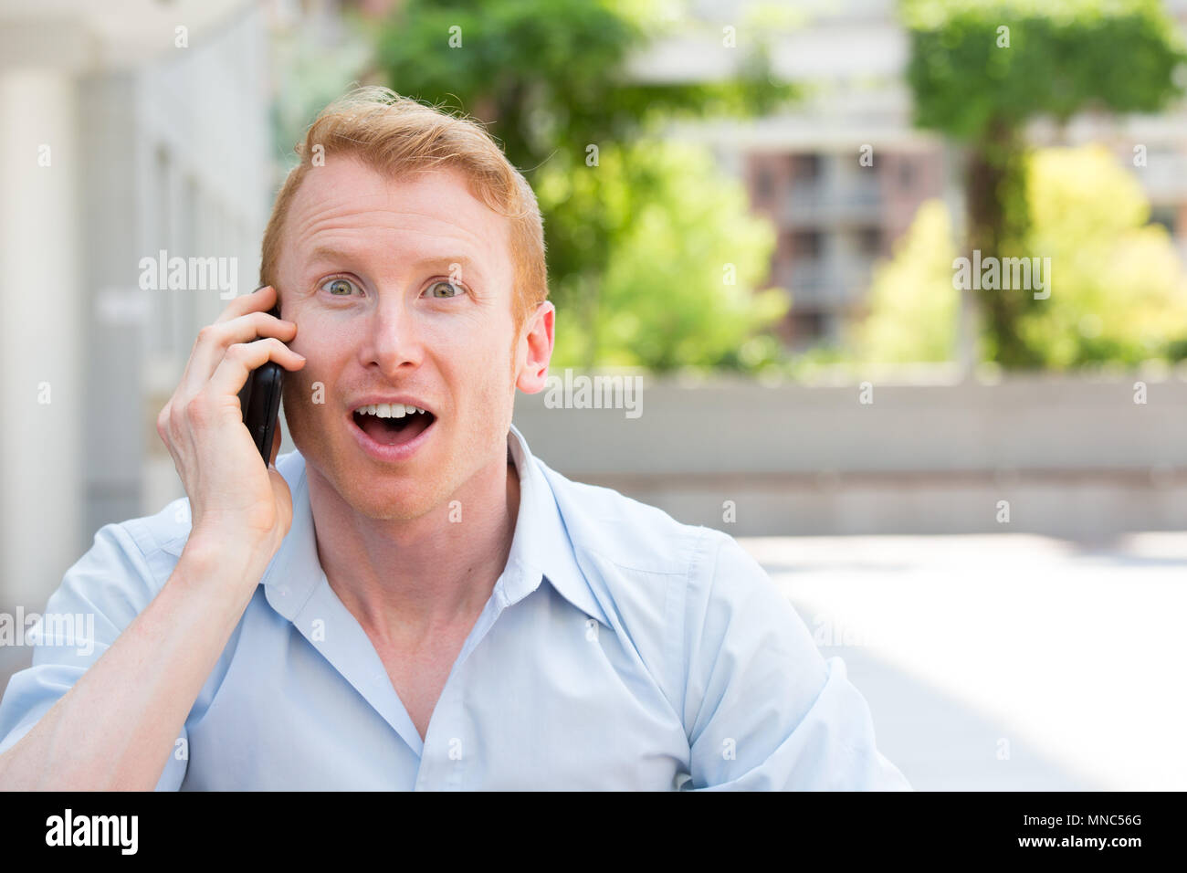 closeup portrait, young happy ecstatic man with wide open mouth talking ...
