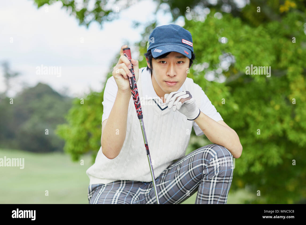 Portrait asian golf player hi-res stock photography and images - Alamy