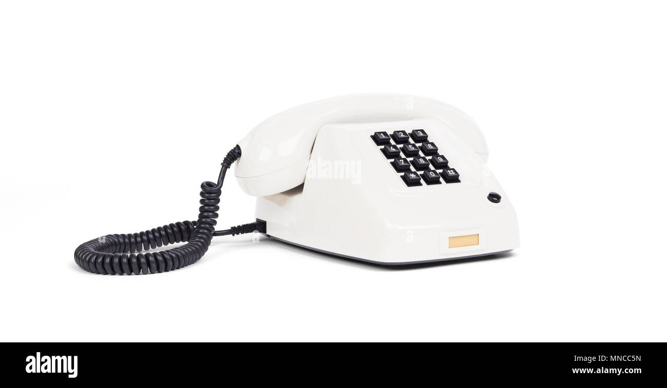 Vintage white telephone with a white background Stock Photo - Alamy