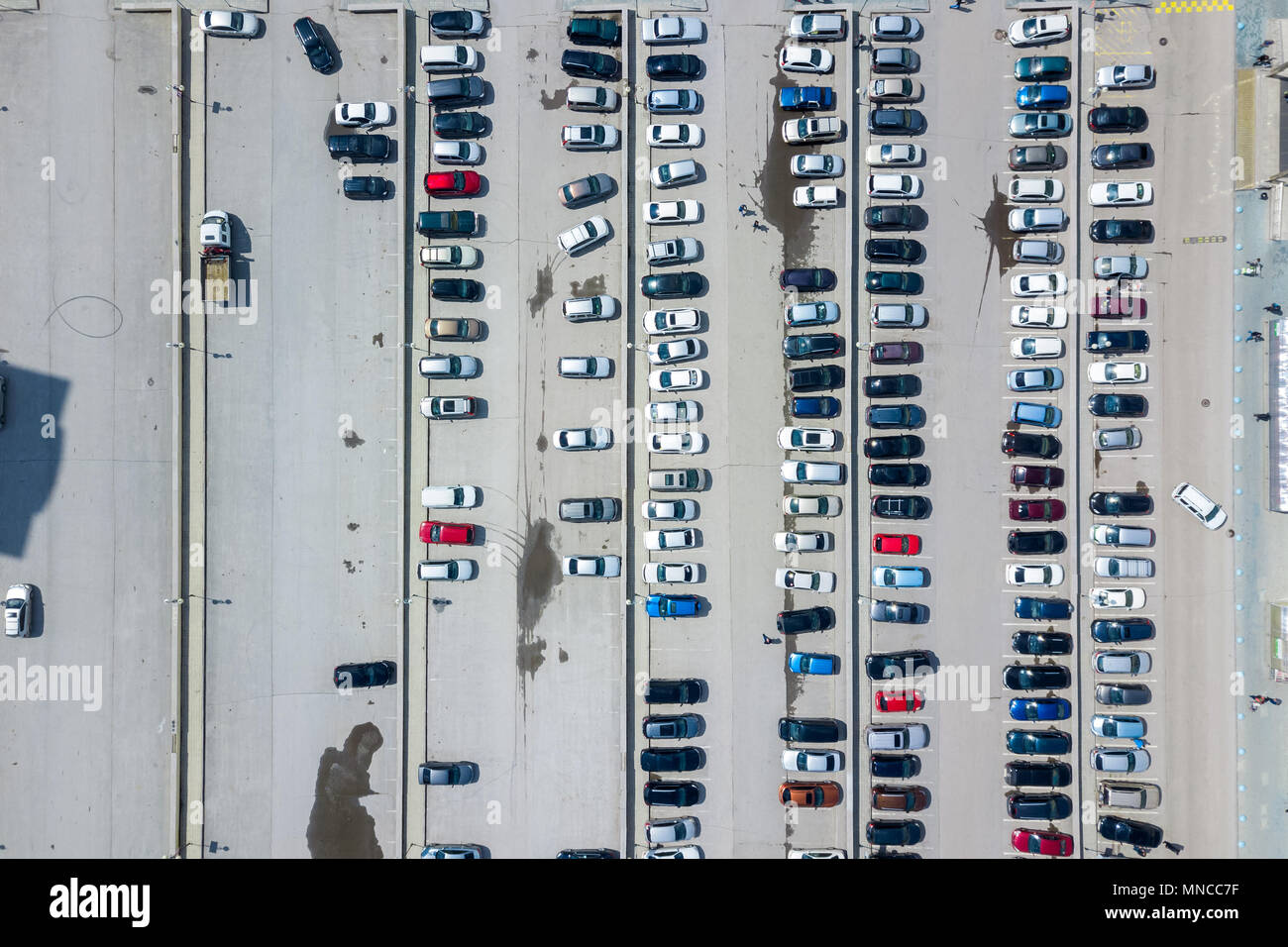 Aerial top view of parking lot with many cars from above ...