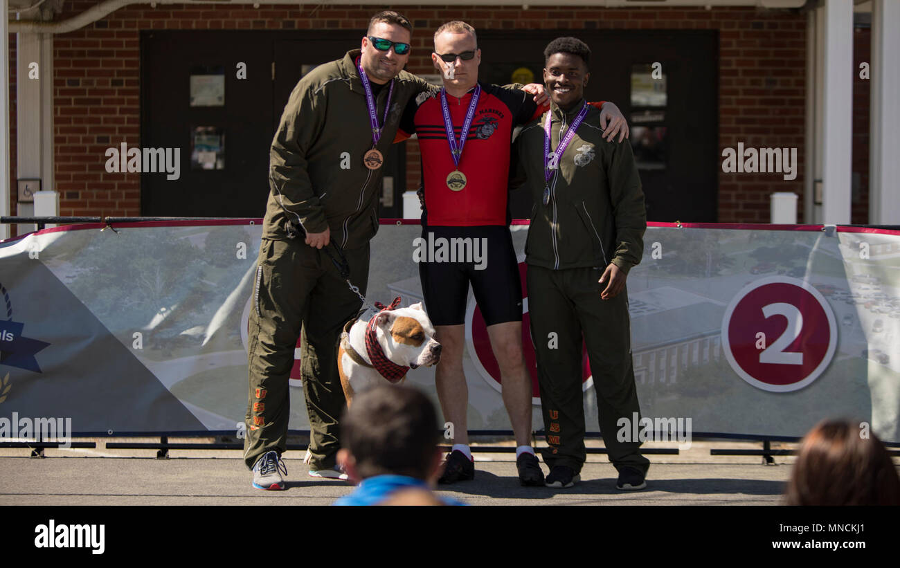 From left to right, U.S. Marine Corps veteran Brandon Stevenson, Staff ...