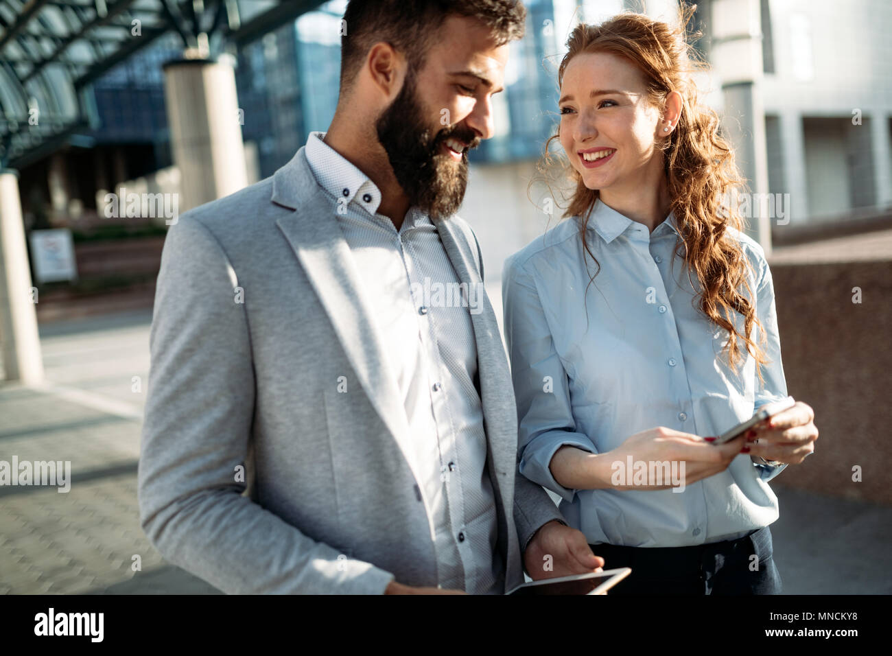 Picture of handsome man and beautiful woman as business partners Stock ...