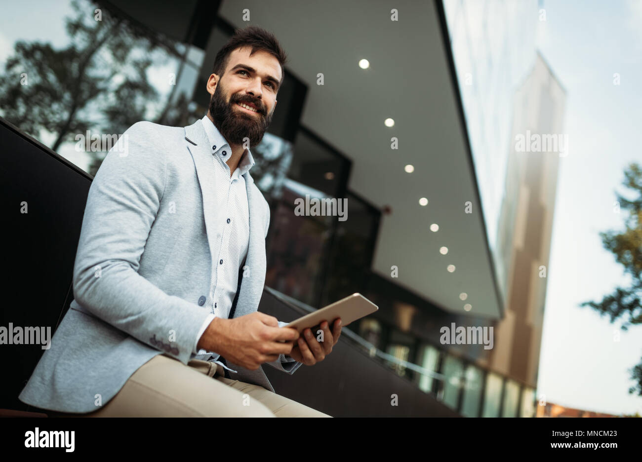 Suit confident hi-res stock photography and images - Alamy