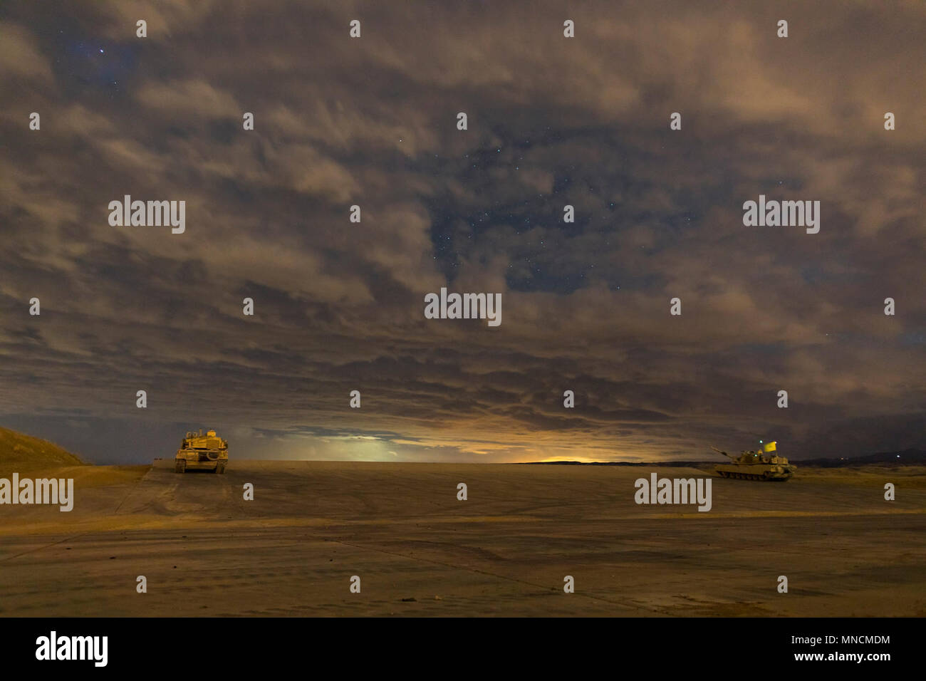 U.S. Army M1A2 Abrams tanks with the 3rd Armored Brigade Combat Team ...