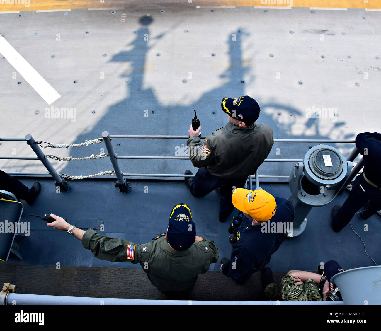 OKINAWA, Japan (March 19, 2018) Capt. John Howard (left), Commanding ...