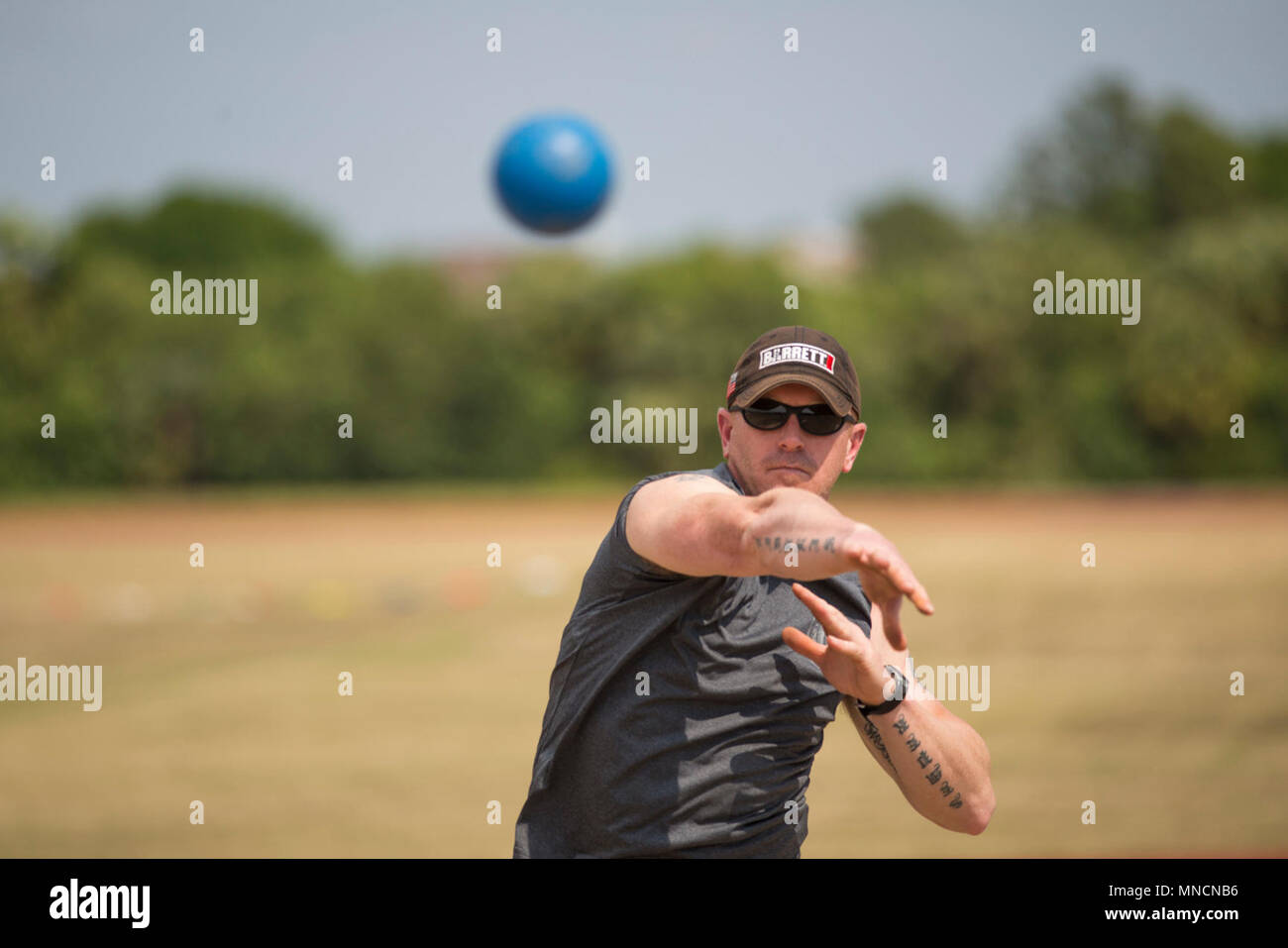 USSOCOM's Marine Master Sgt. Benjamin Brodt trains in shot put for the ...