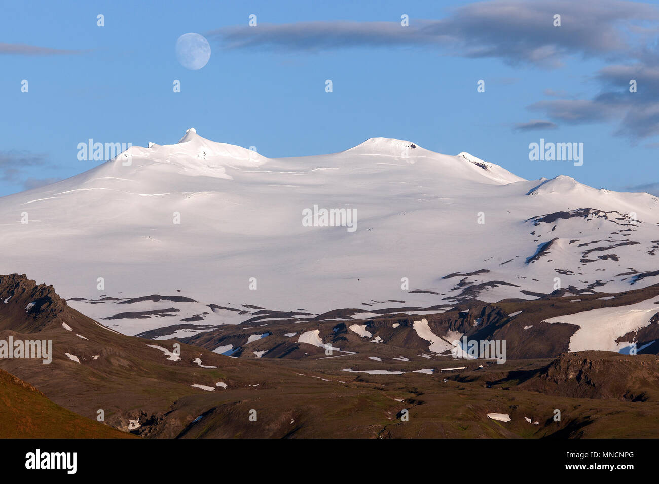 Snow-covered Snæfell volcano with Snæfellsjökul glacier and full moon ...