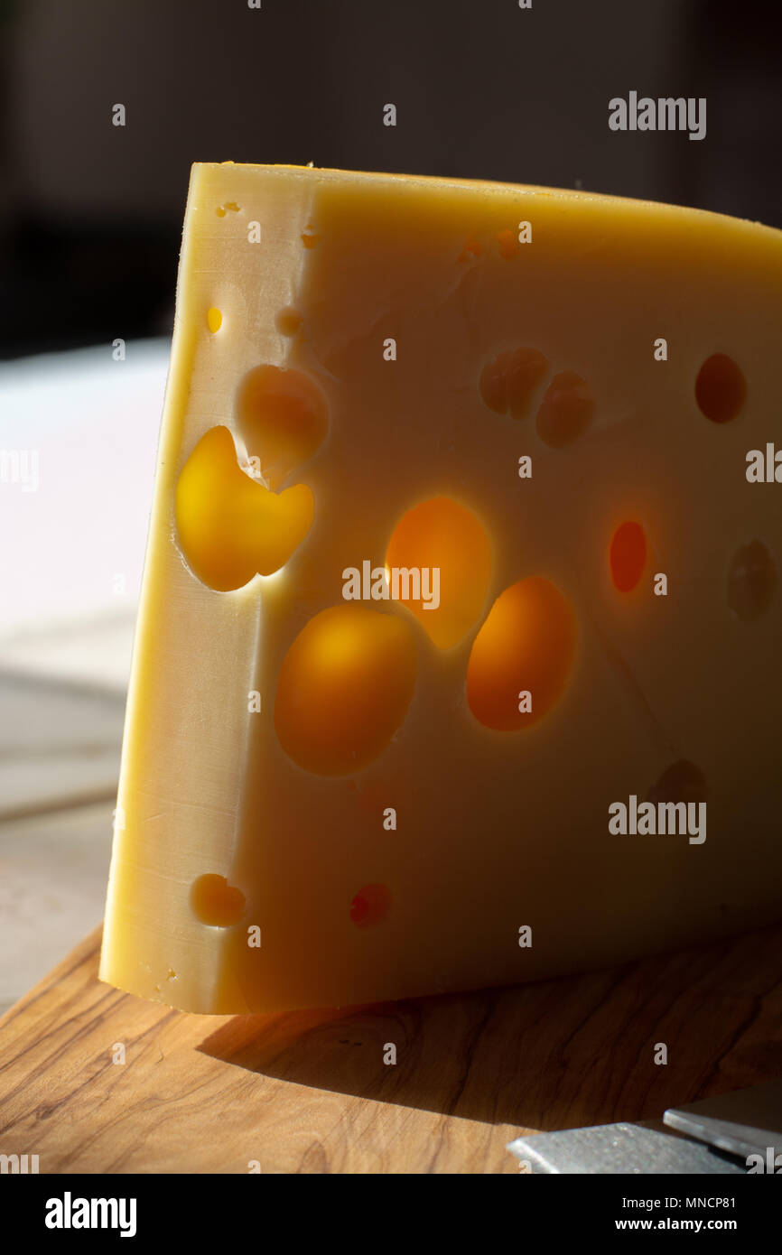 Dutch hard cheese Maasdam or Emmentaler, cheese with holes Stock Photo ...