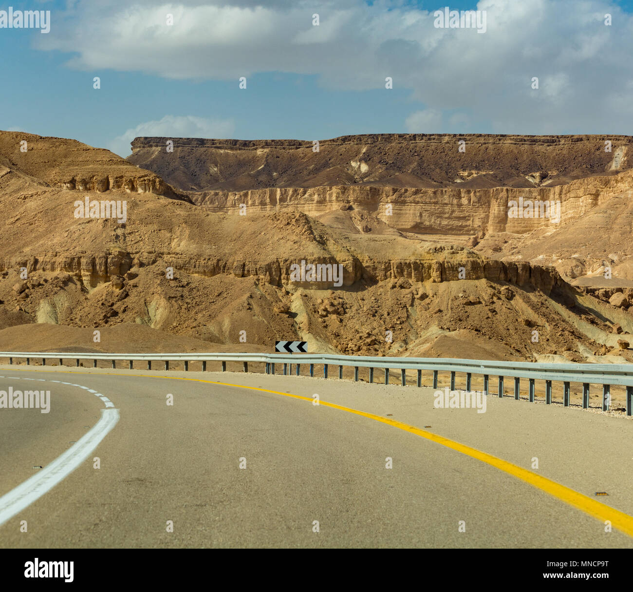 Asphalt road in desert Negev, Israel, road 40, transport infrastructure ...