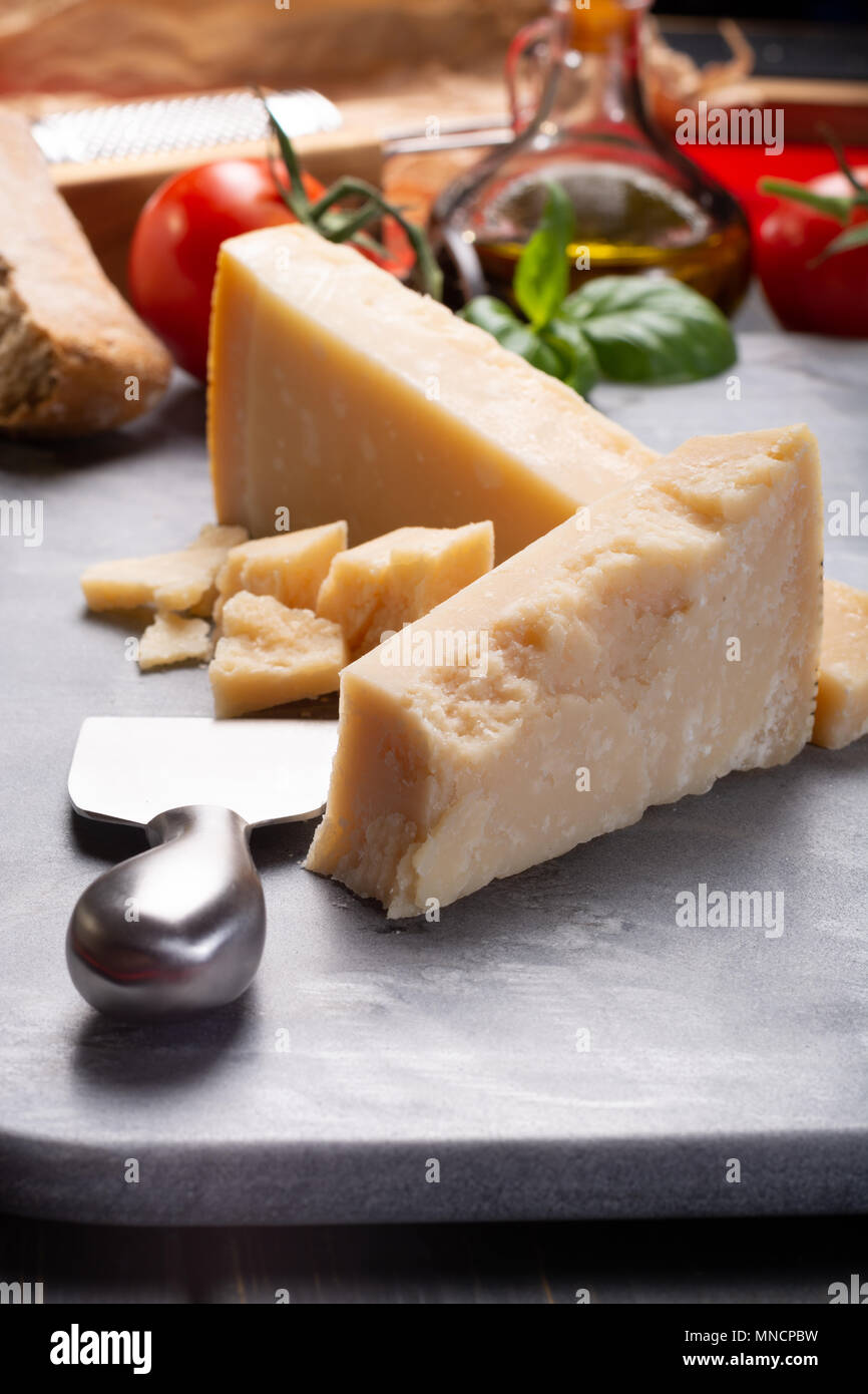 Traditional italian food - aged Italian parmesan hard cheese Parmigiano ...