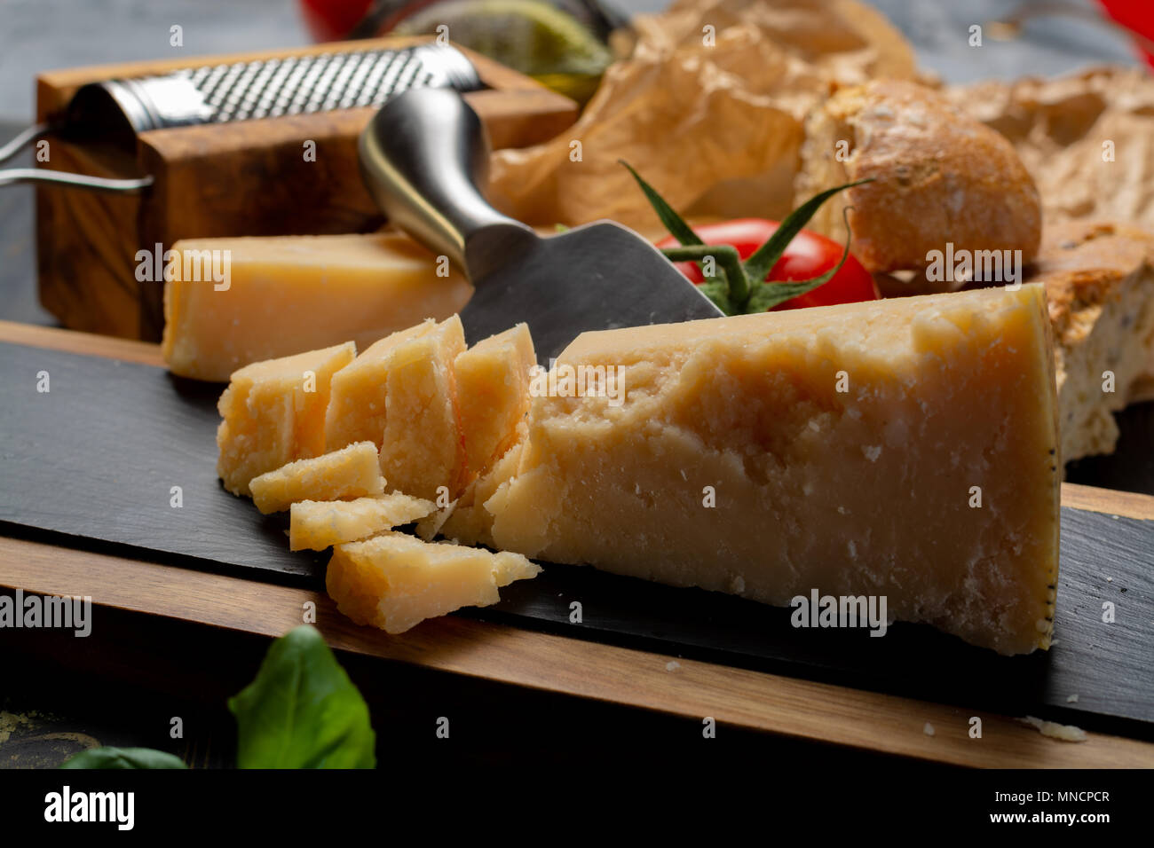 Traditional italian food - aged Italian parmesan hard cheese Parmigiano ...