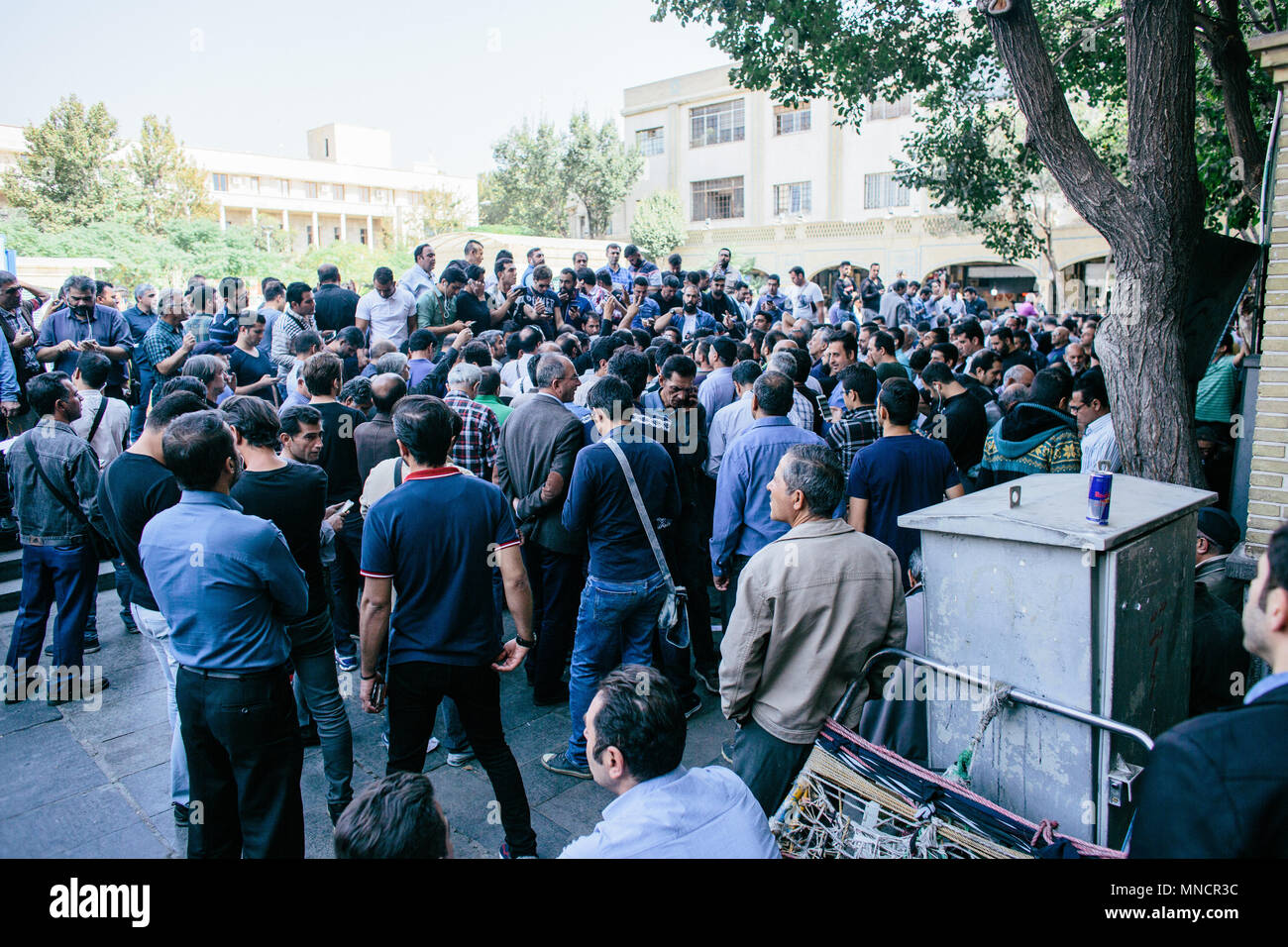 Tehran, Iran - October 9, 2017: A large group of people are trading ...