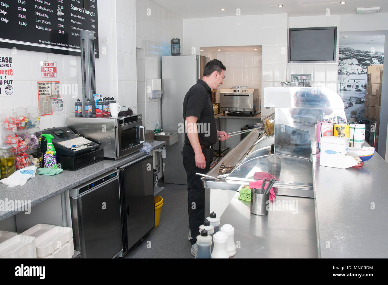 Fish and chip shop counter hi-res stock photography and images - Alamy