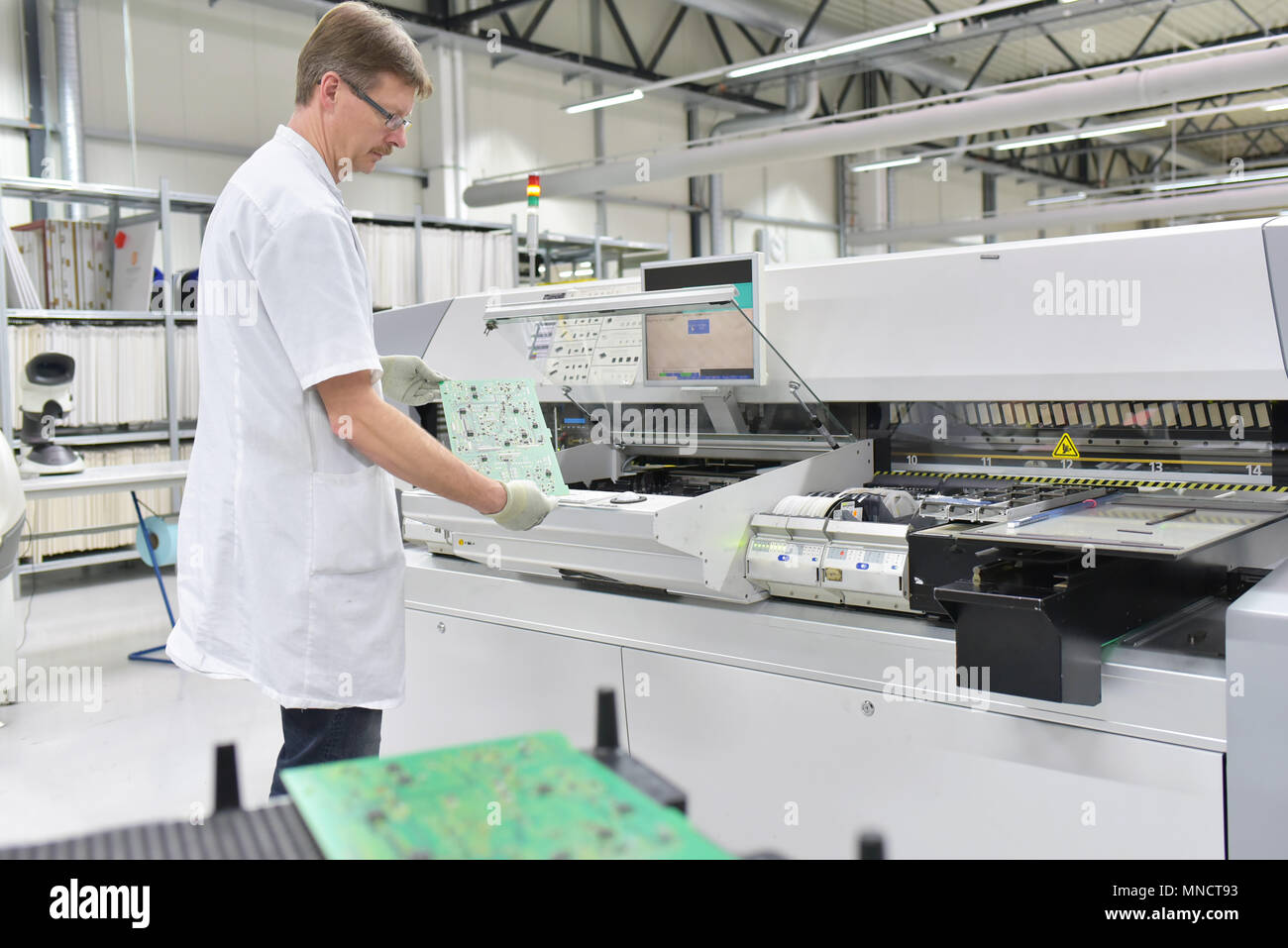 industrial factory for assembly of microelectronics - interior and ...