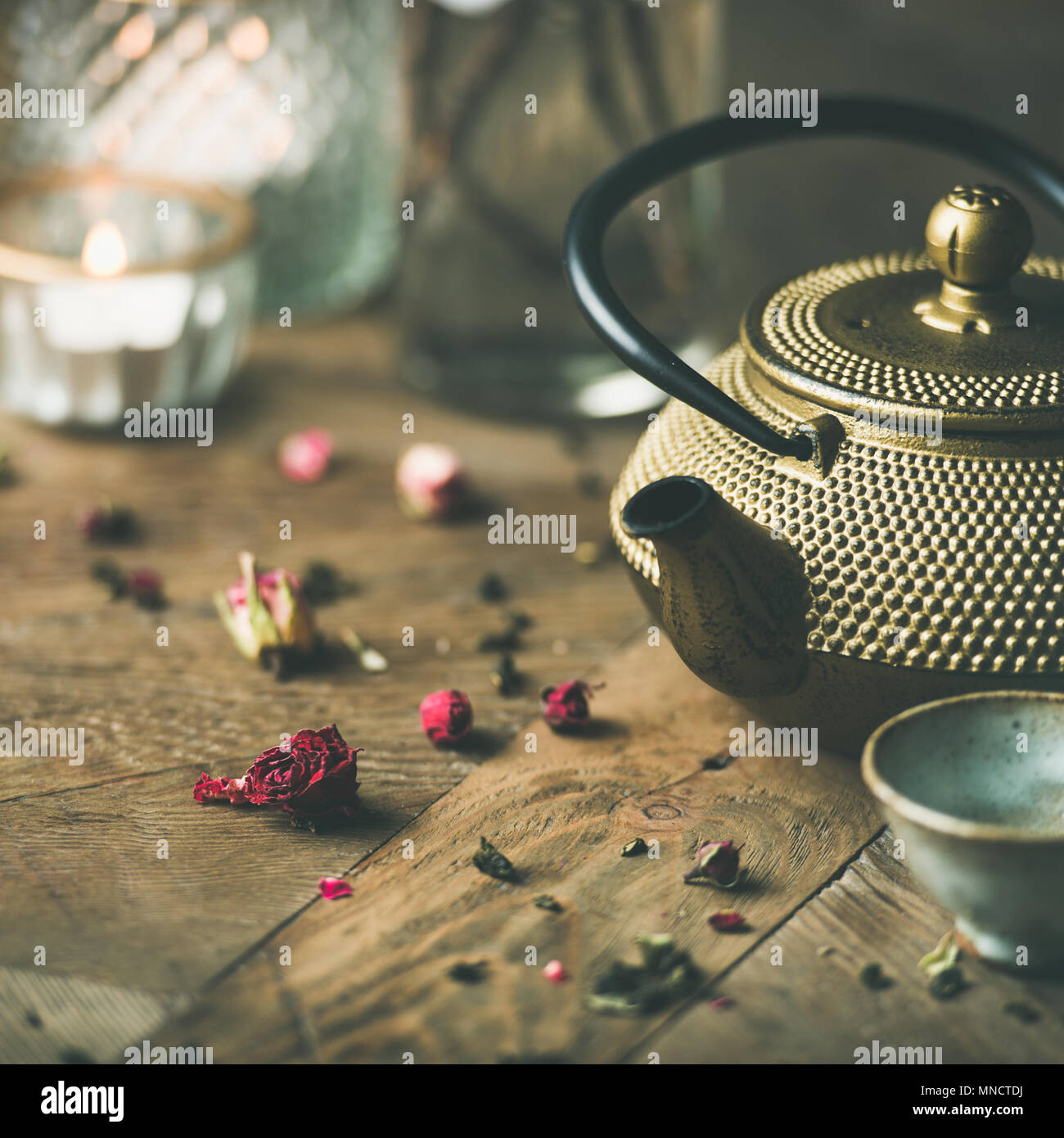 Traditional Asian tea ceremony arrangement over wooden background ...