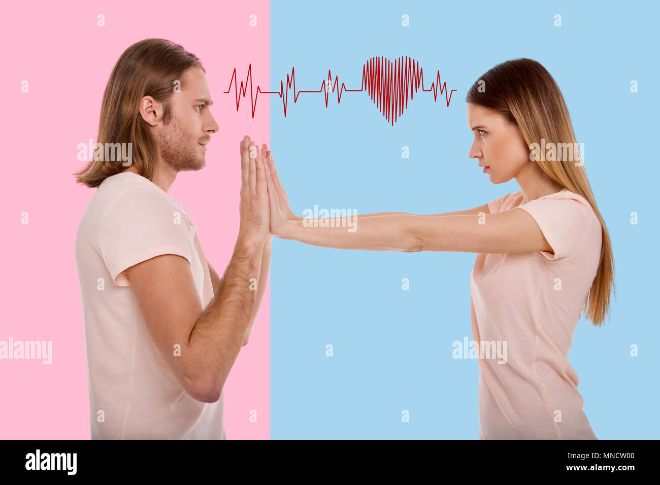 Emotional woman pushing her boyfriend and feeling angry Stock Photo - Alamy