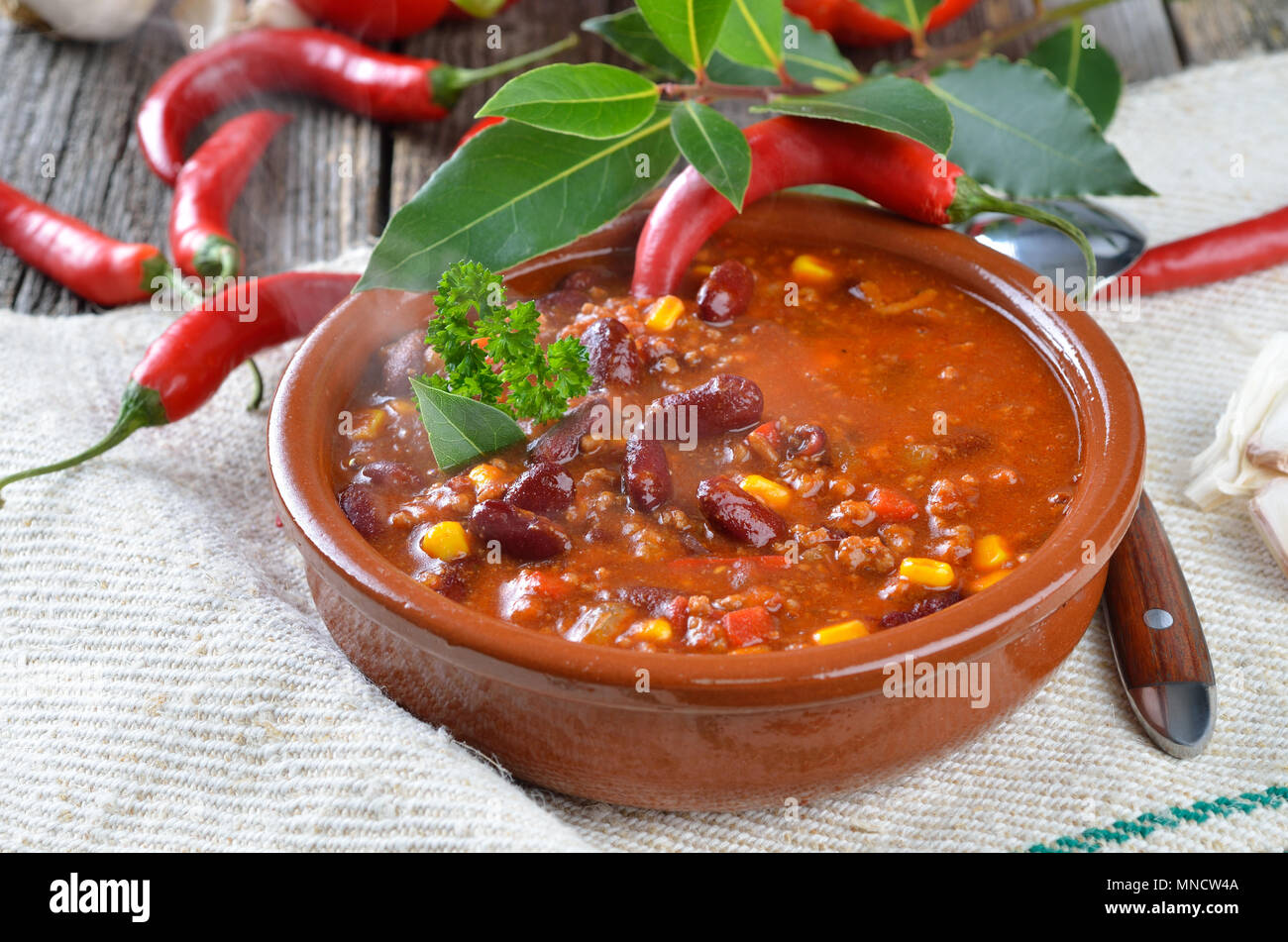 Hot chili con carne with kidney beans with minced meat Stock Photo - Alamy