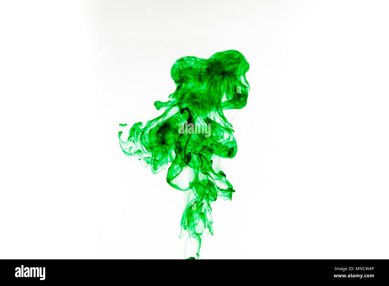 Green ink in water on hi-res stock photography and images - Alamy
