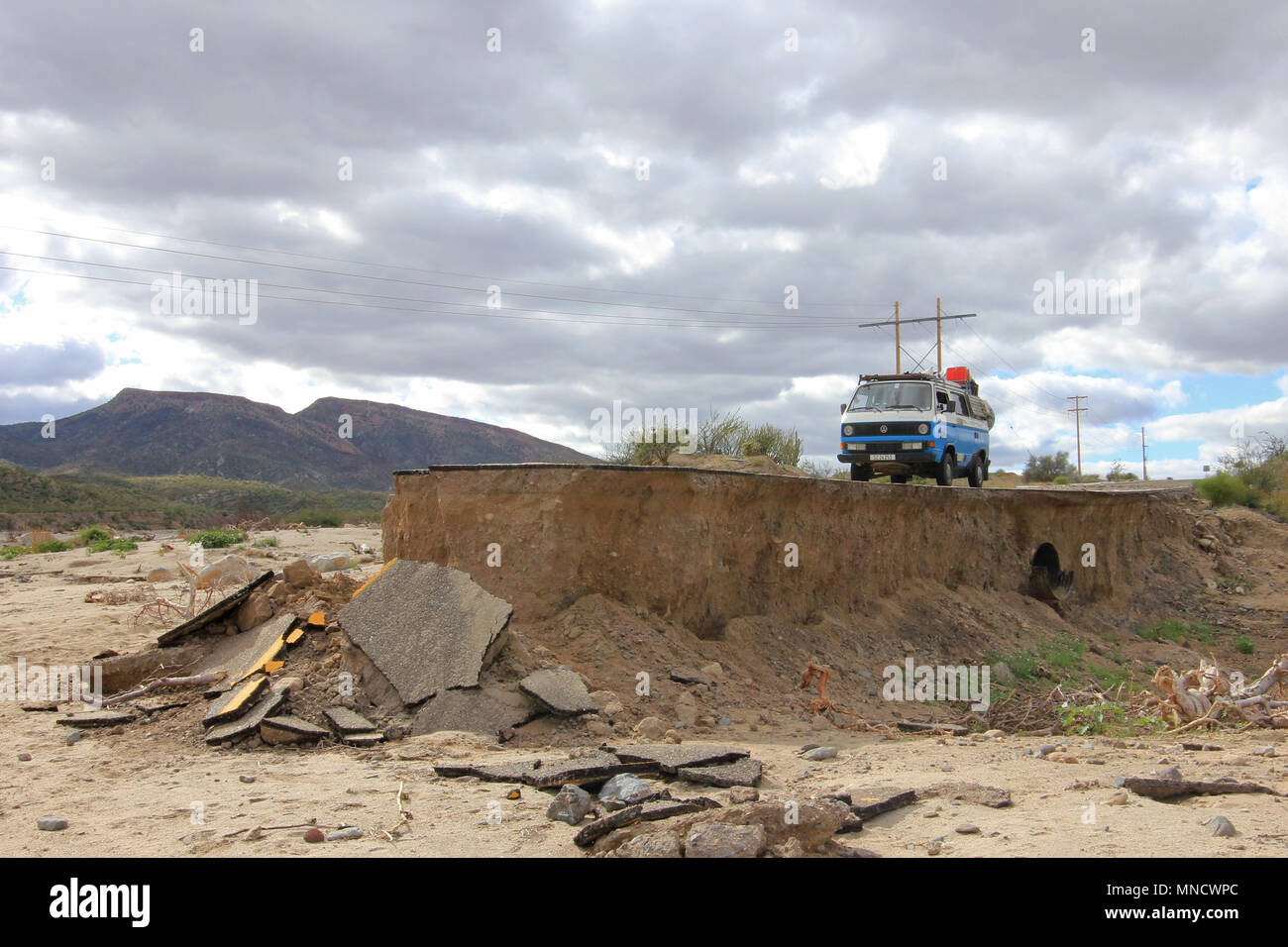Old vintage van on damaged and washed out road in Baja California ...