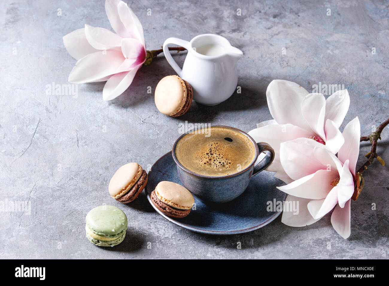 Coffee with spring flowers Stock Photo - Alamy