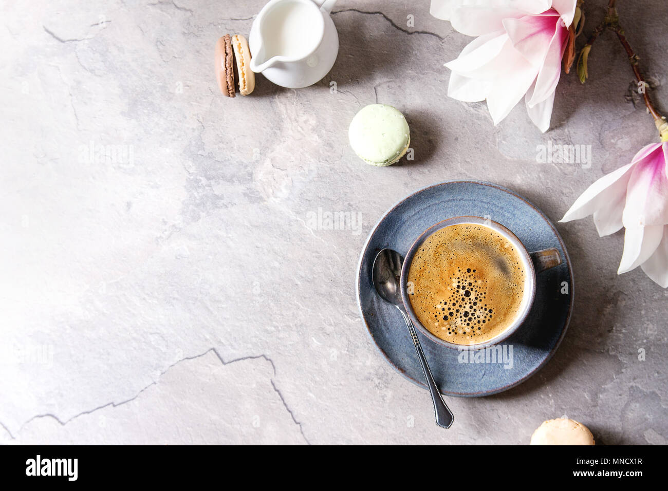 Coffee with spring flowers Stock Photo - Alamy