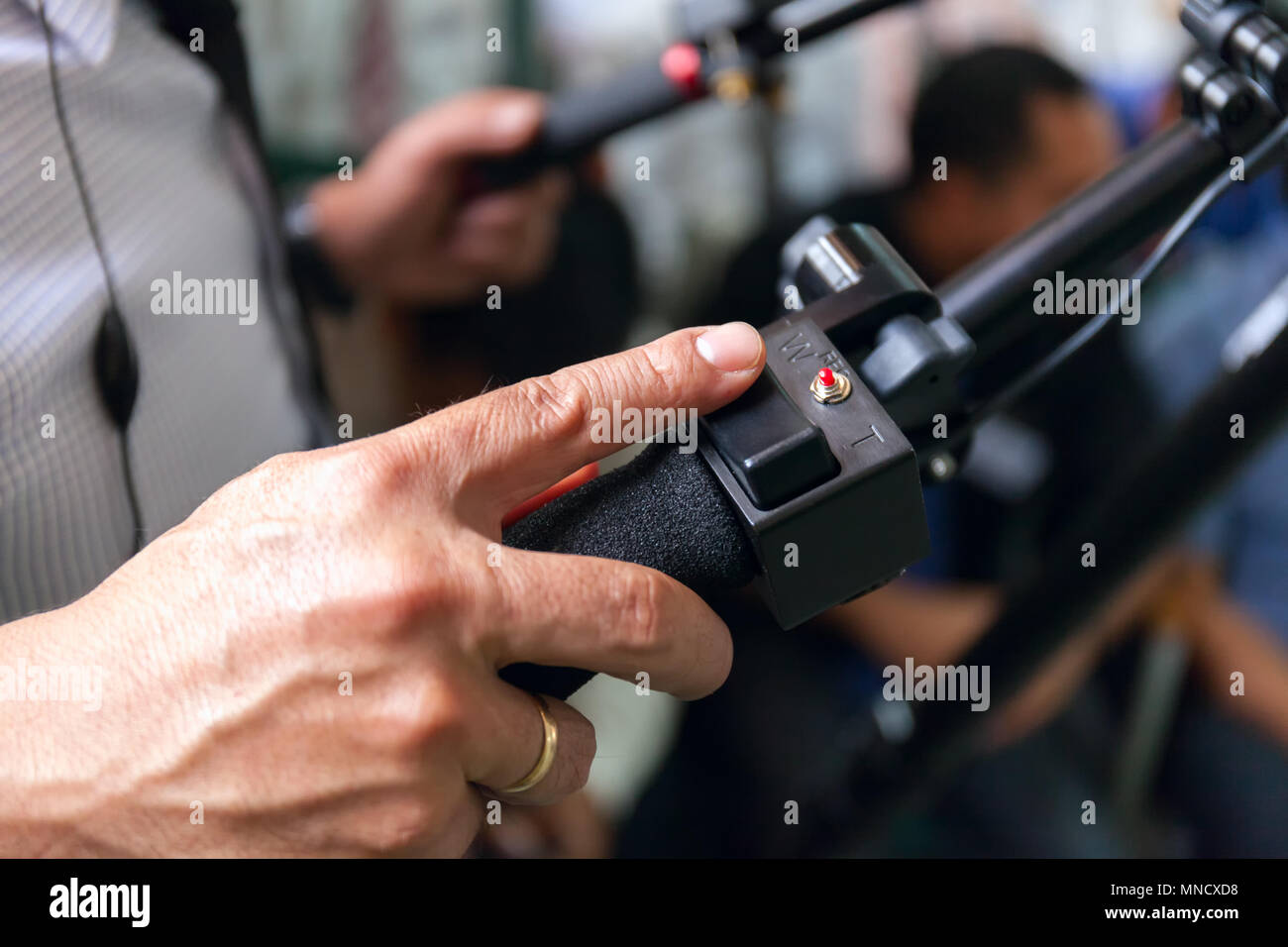Male operator professional camera hi-res stock photography and images ...
